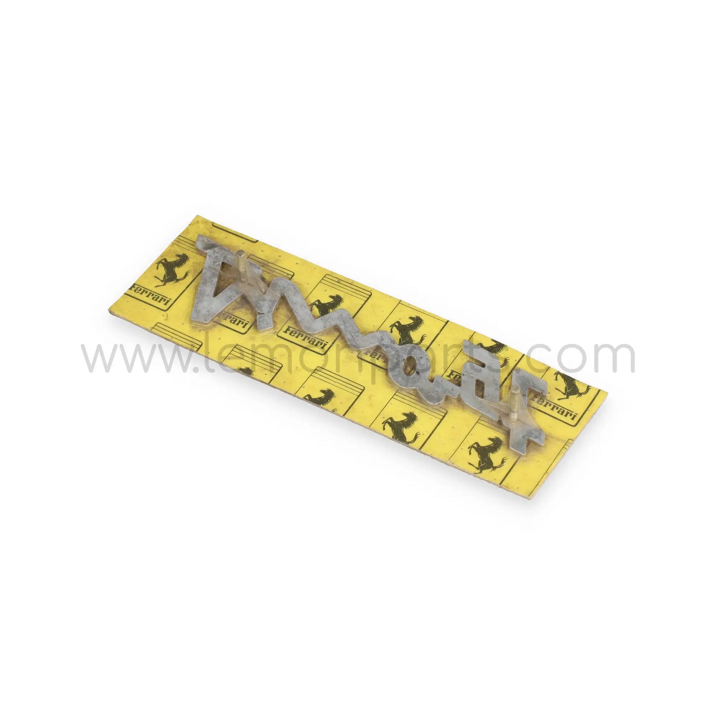 NOS Ferrari Dino GT script badge in original package for Ferrari Dino ...